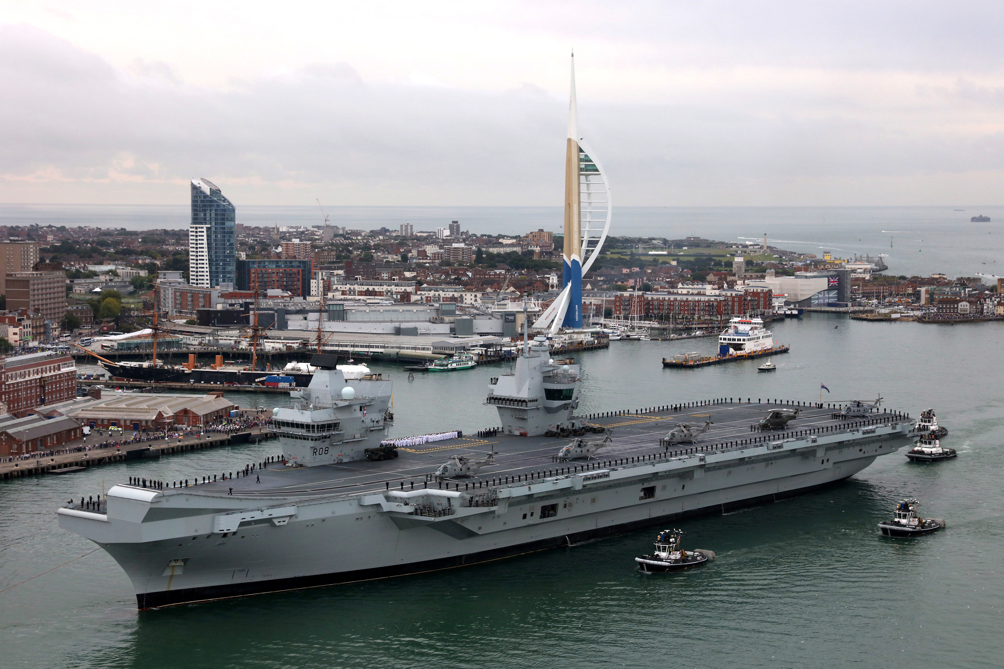 British Royal Navy future flagship HMS Queen Elizabeth sails into home ...